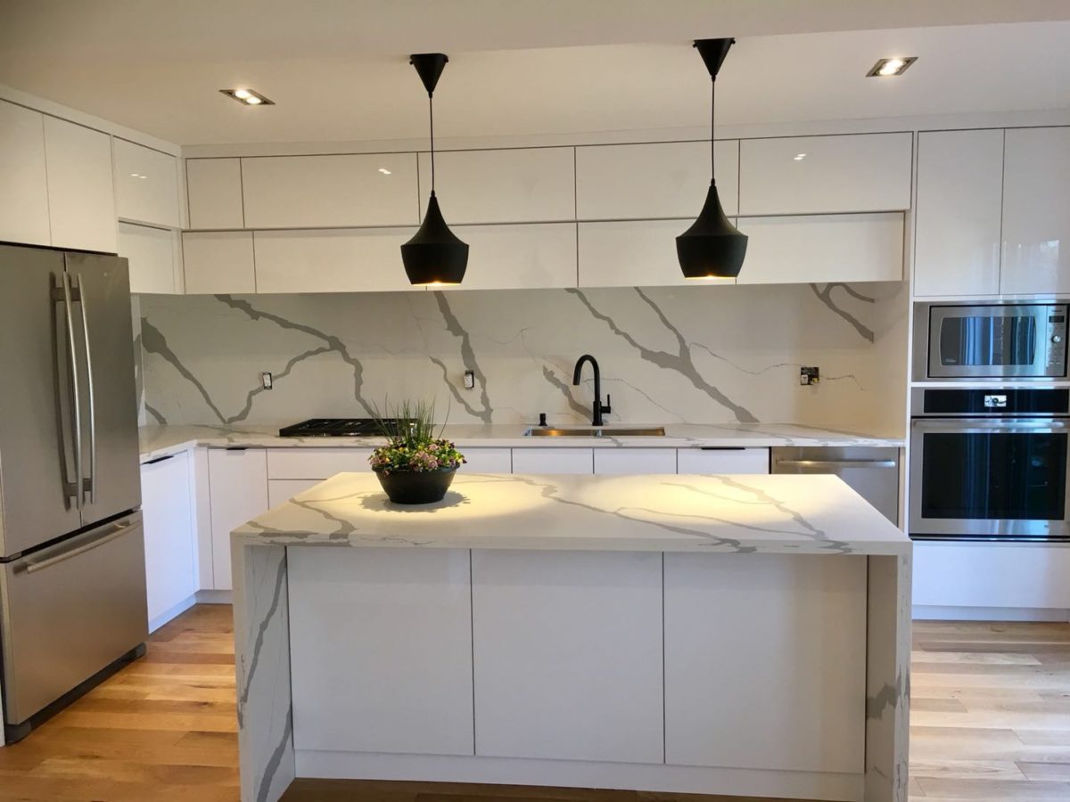 Modern Kitchen Featuring Push Open Doors and Flush With Wall Design ...
