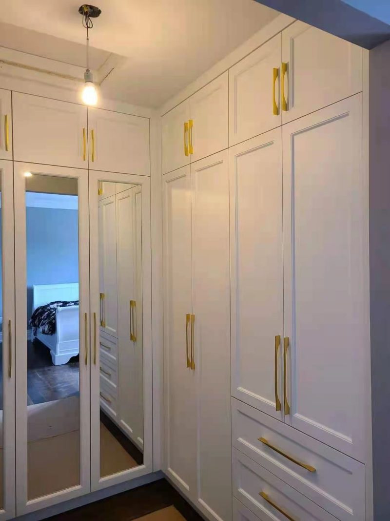 Walk In Closet Featuring All White Cabinetry and All Around Crown ...